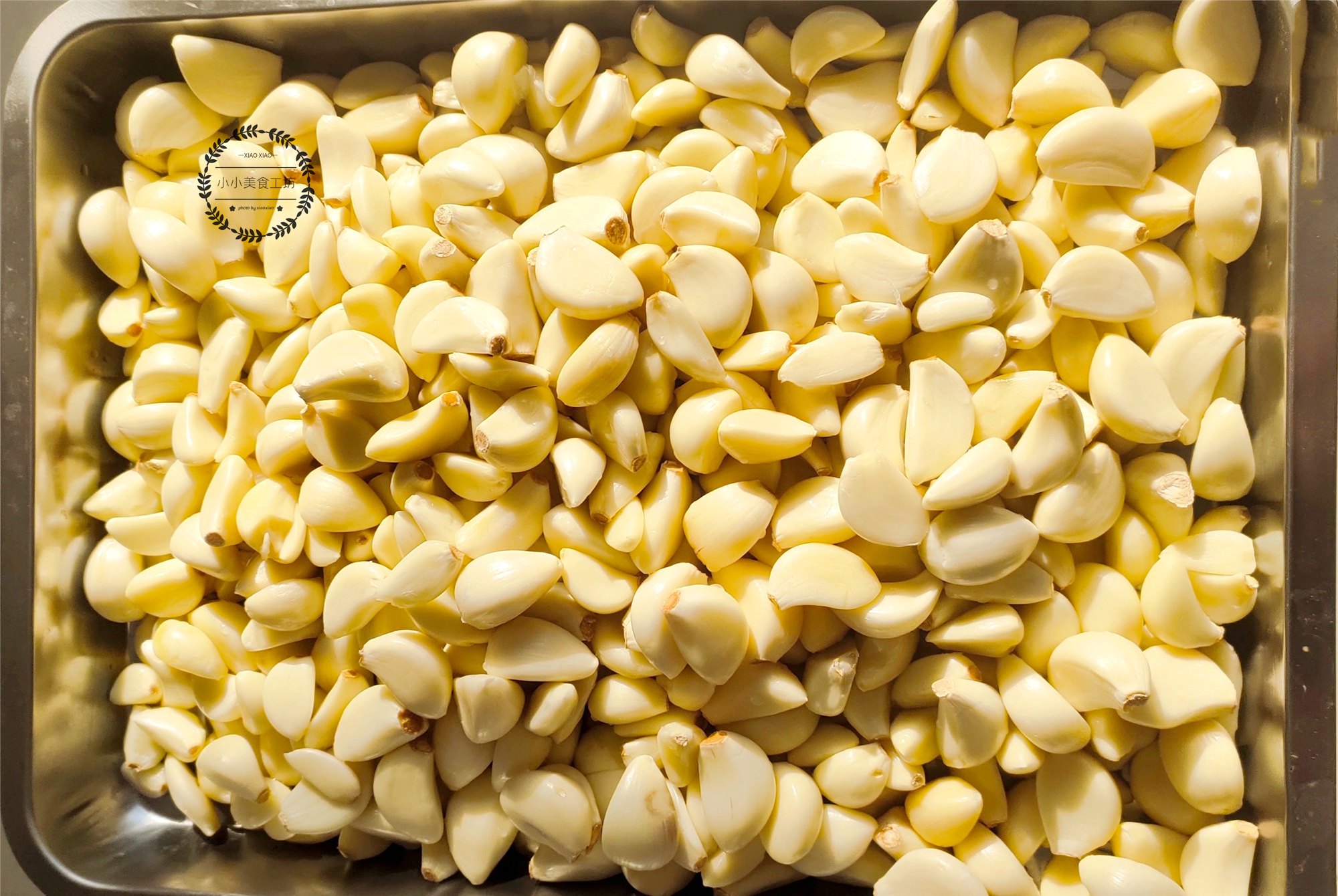 For pickled laba garlic, some people cut the garlic root and some ...
