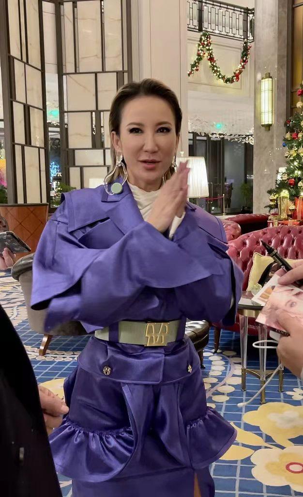 The queen of music, Coco Li, attended the brand event, wearing a long ...