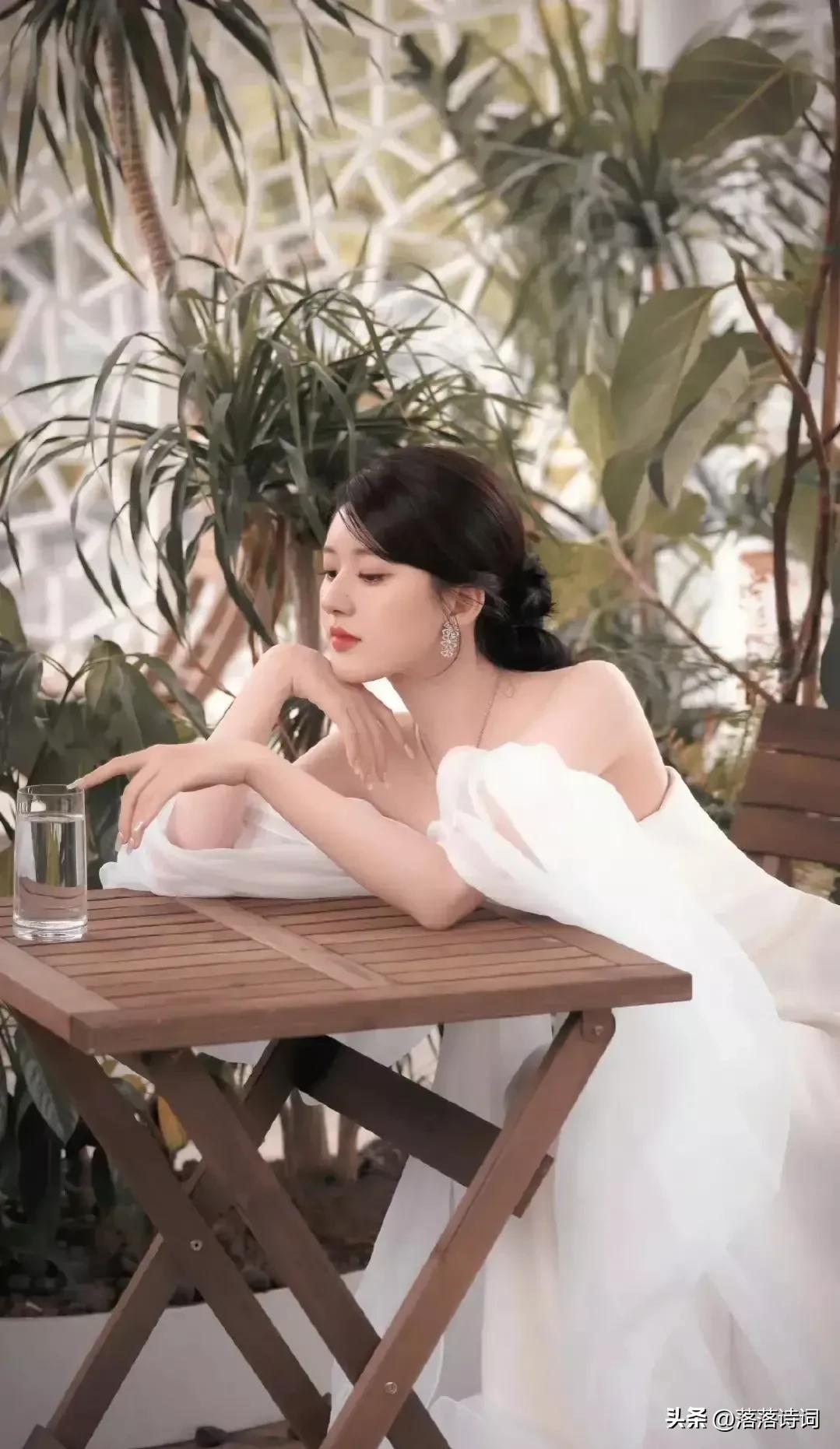 Continuation poem: A crescent moon hangs in the middle of the sky, the ...