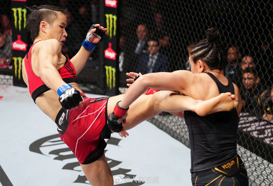 Back to the top!Zhang Weili regains UFC world championship belt - iNEWS