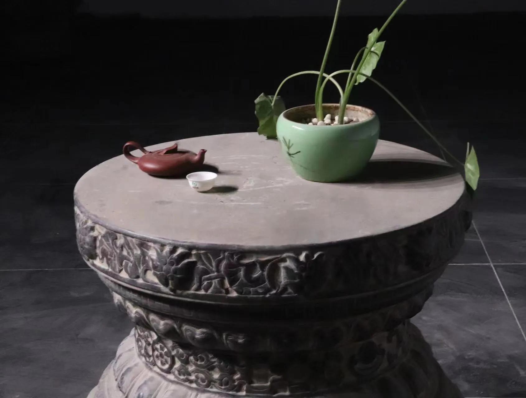 Xuni bluestone seat. The size is 60 in height and 76 in diameter. The ...