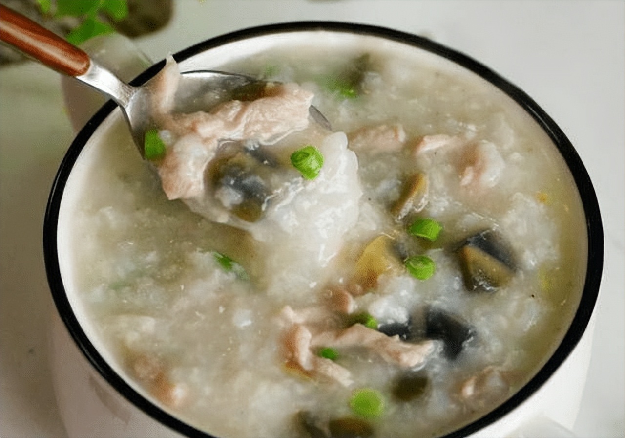 Different methods of preserved egg and lean meat porridge, the porridge ...