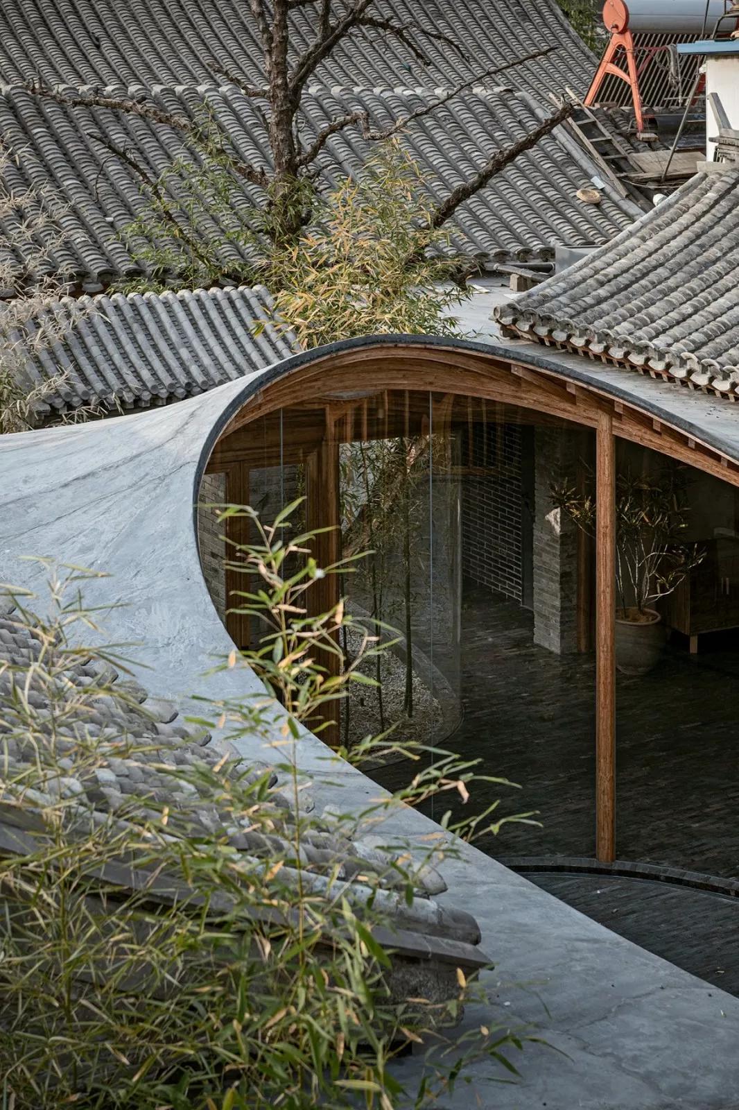 The old courtyard house was transformed into a small clubhouse, the ...