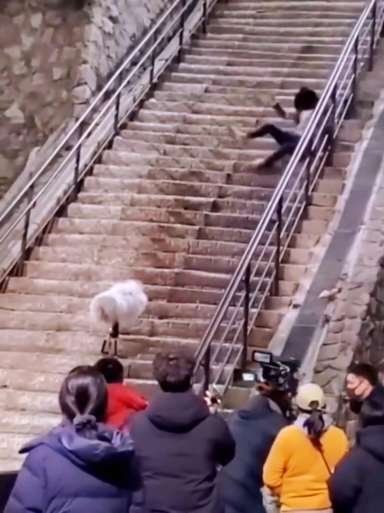 The scene of a stuntman making a movie and falling from the steps is ...