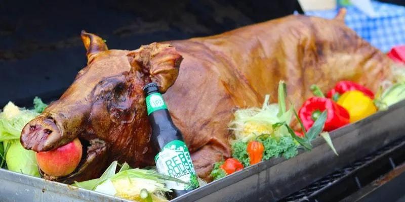 What is the origin of the apple in the mouth of the roast suckling pig ...