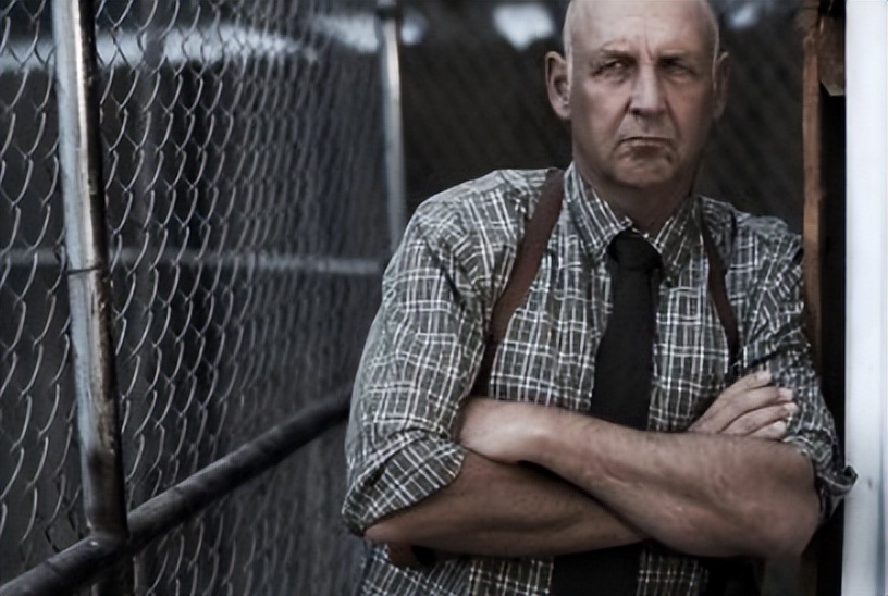 What kind of realism does the fixed shot in "The Wire" present to the ...