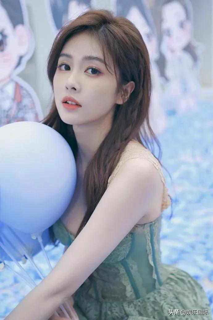 Bailu has a beautiful birthday photo wearing a light green tube top ...