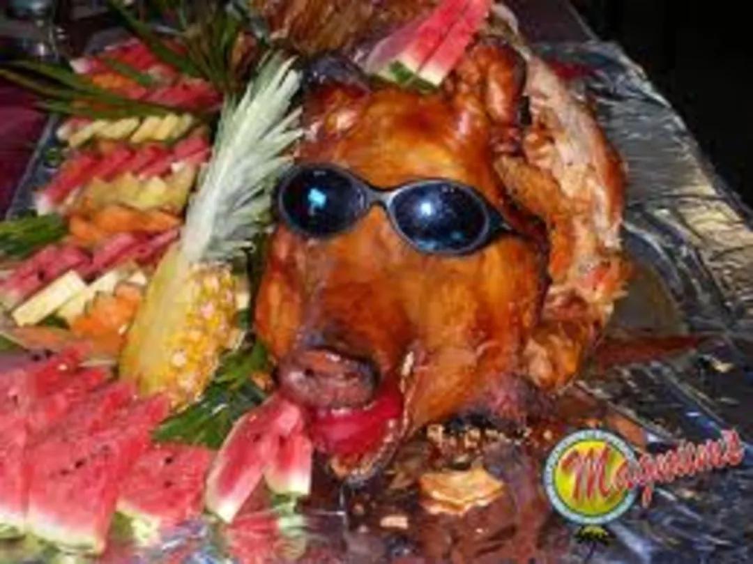 What is the origin of the apple in the mouth of the roast suckling pig ...