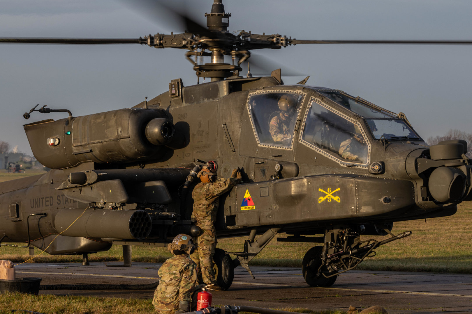 Refueling an AH-64 Apache during the Forward Arming and Refueling Point ...