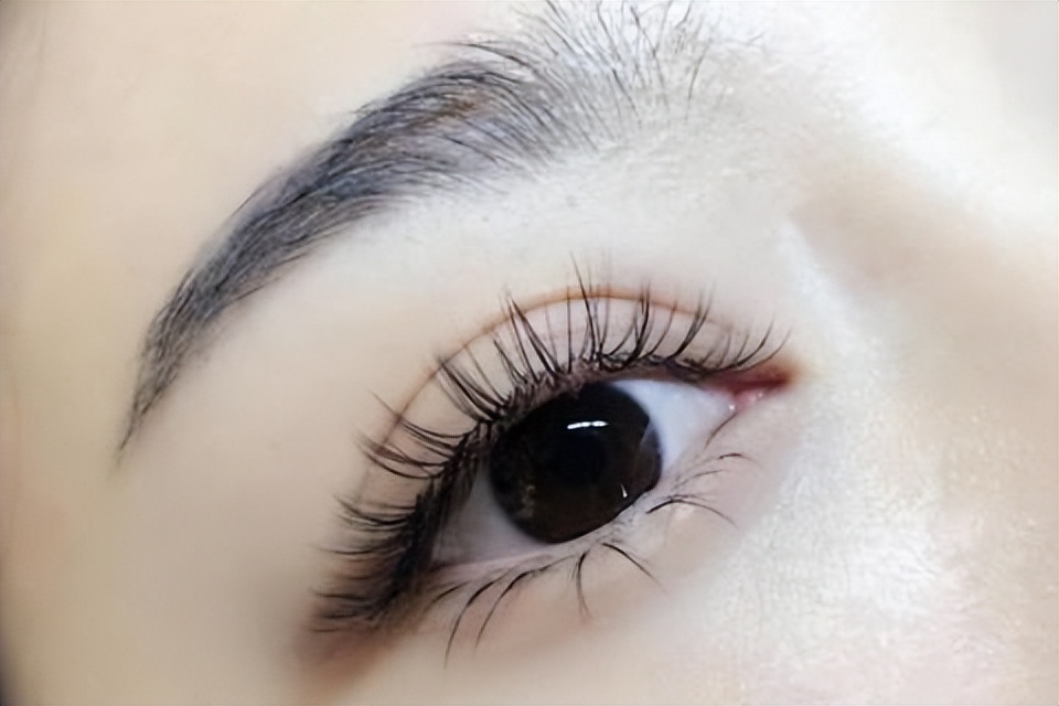 Face of a man with beautiful eyelashes and upturned eyelashes - iMedia