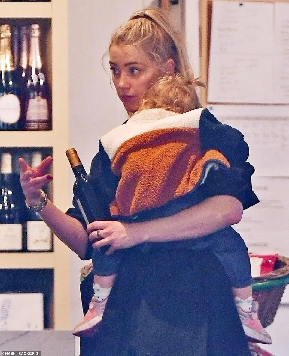 After the lawsuit, Amber lived a low-key life in the small town, but ...