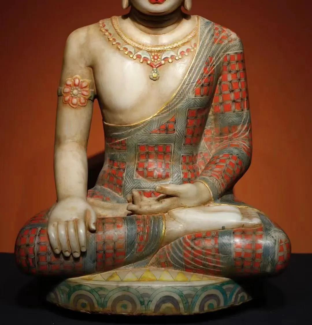 White marble painted Buddha statue - iNEWS
