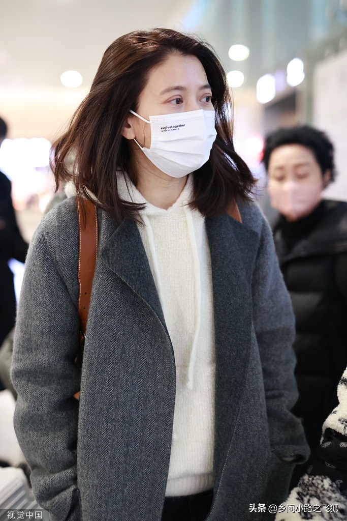 Yuan Yongyi Zhang Zhilin and his wife appeared at the airport Zhang ...