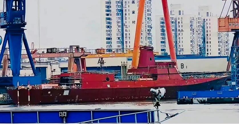 The Type 057 frigate has a volume of 8,000 tons and has 80 units of ...