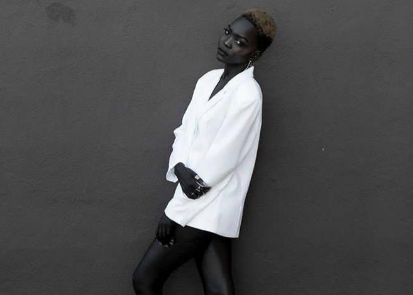 The world's blackest model, even the gums and lips are black, but the ...
