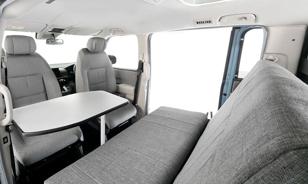 Equipped with a raised roof, the small body also has a complete kitchen ...