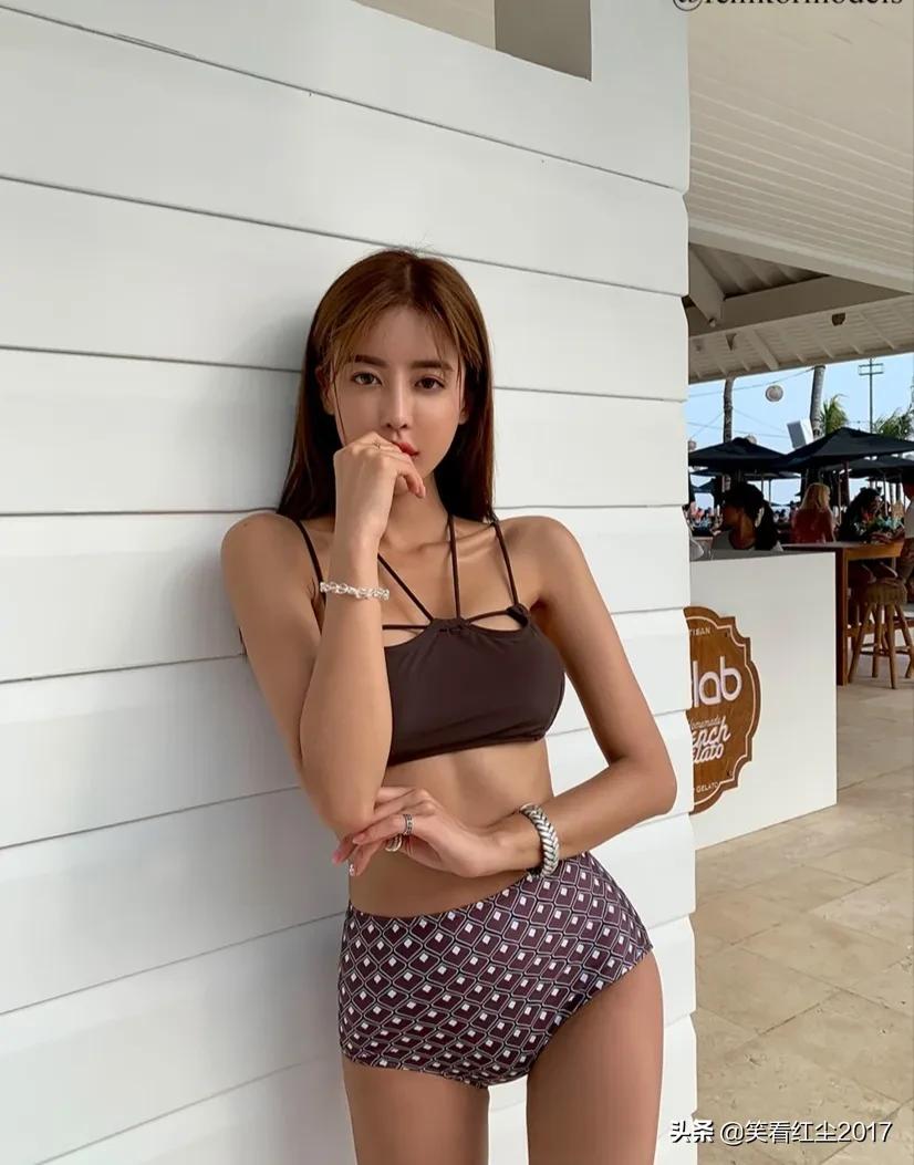 Korean model Da Woon, wearing a black swimsuit, photoshoot by the pool - iNEWS
