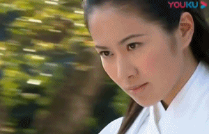 The 43-year-old wears double ponytails and picks her feet during live ...