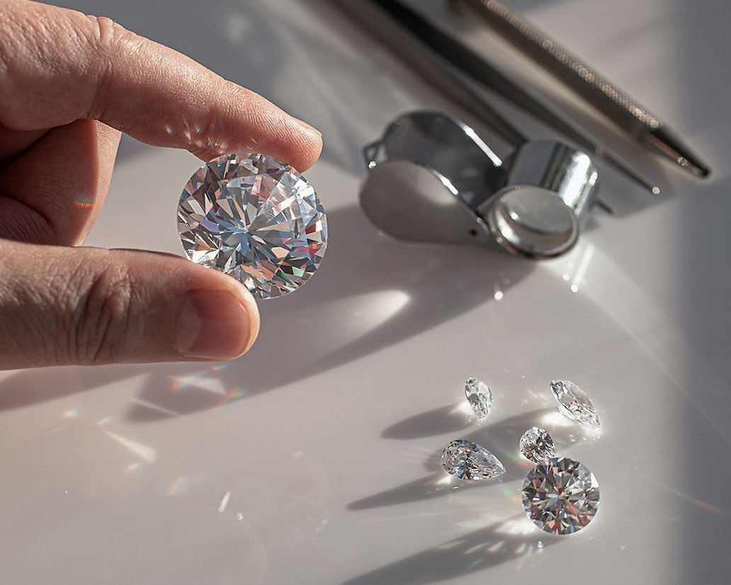 How much is the price difference between natural diamonds and man-made ...