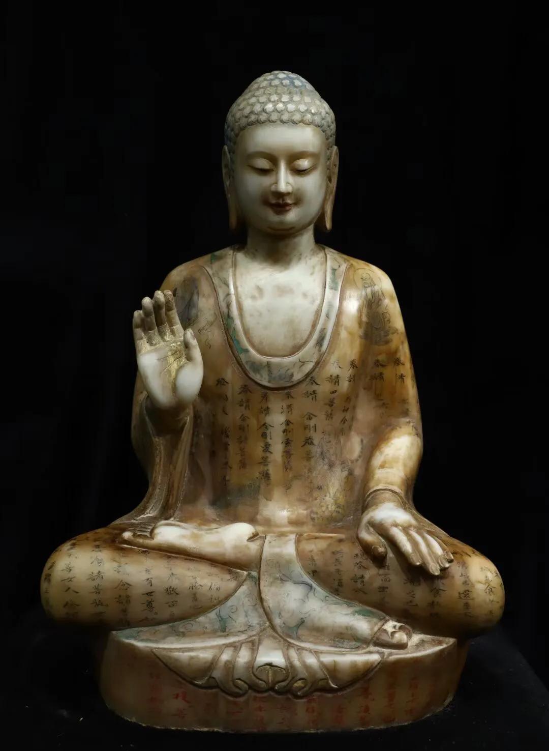 Painted statue of Sakyamuni - iNEWS