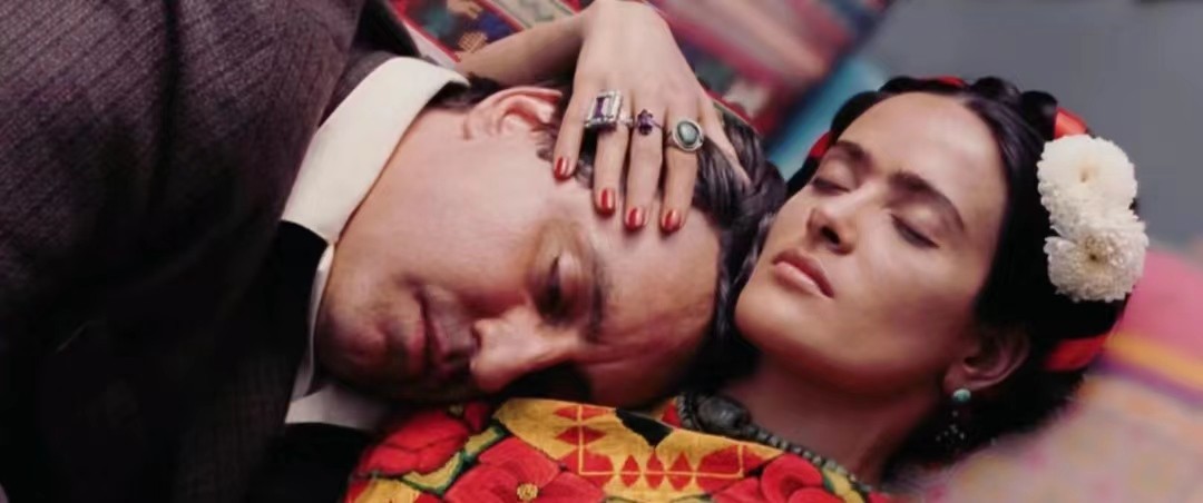 What is the role of the use of song, dance and color scenes in the ...