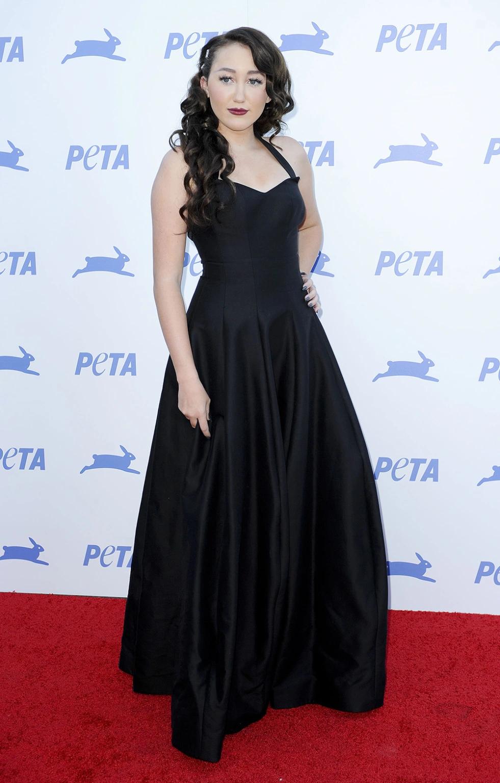 Singer wears flame robes from head to toe in burning house to promote ...