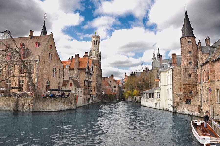 What economic opportunities does the historic port of Bruges bring to ...