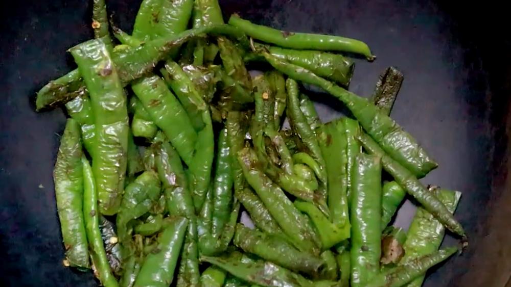 The home-style practice of traditional Sichuanese tiger skin peppers ...