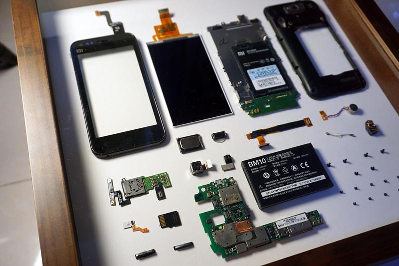 What are the main components of a mobile phone, and what are their ...