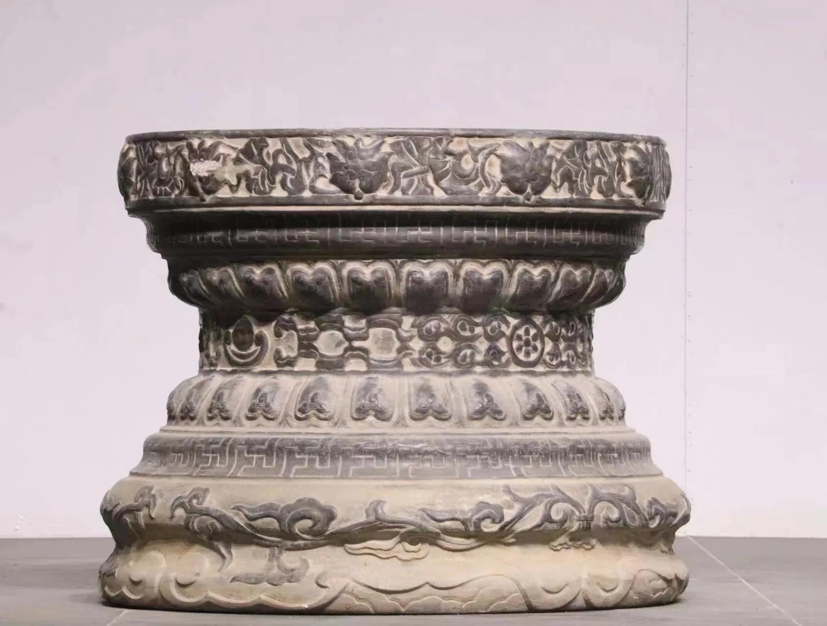 Xuni bluestone seat. The size is 60 in height and 76 in diameter. The ...