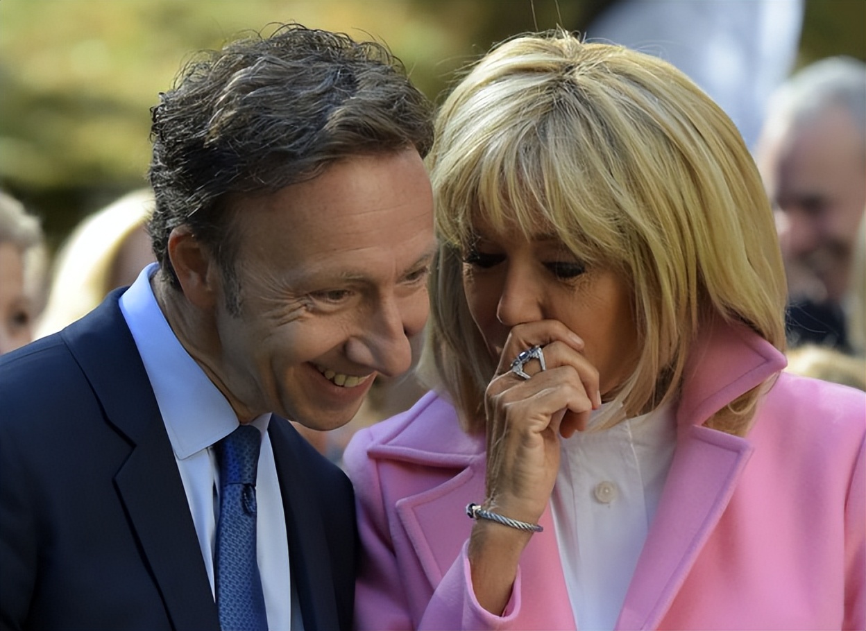 In 2020, Brigitte acted like a baby while holding the hand of a male ...