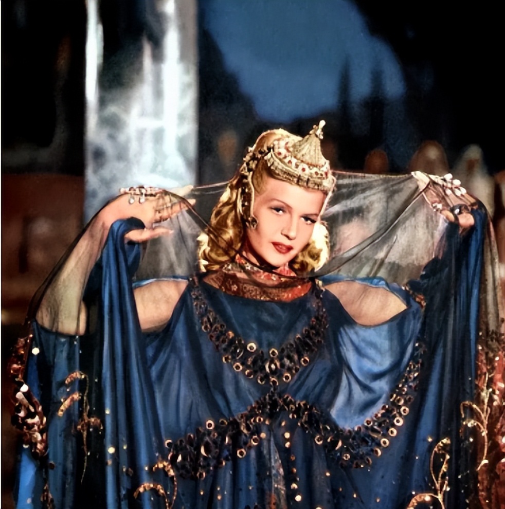 How does Hayworth's performance of "Salome" convey the emotional charm ...
