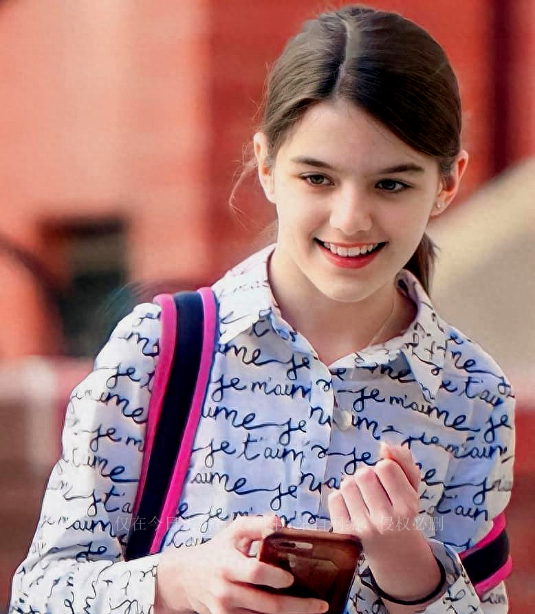 17-year-old Suri is fair-skinned and beautiful, and is taller than Tom ...