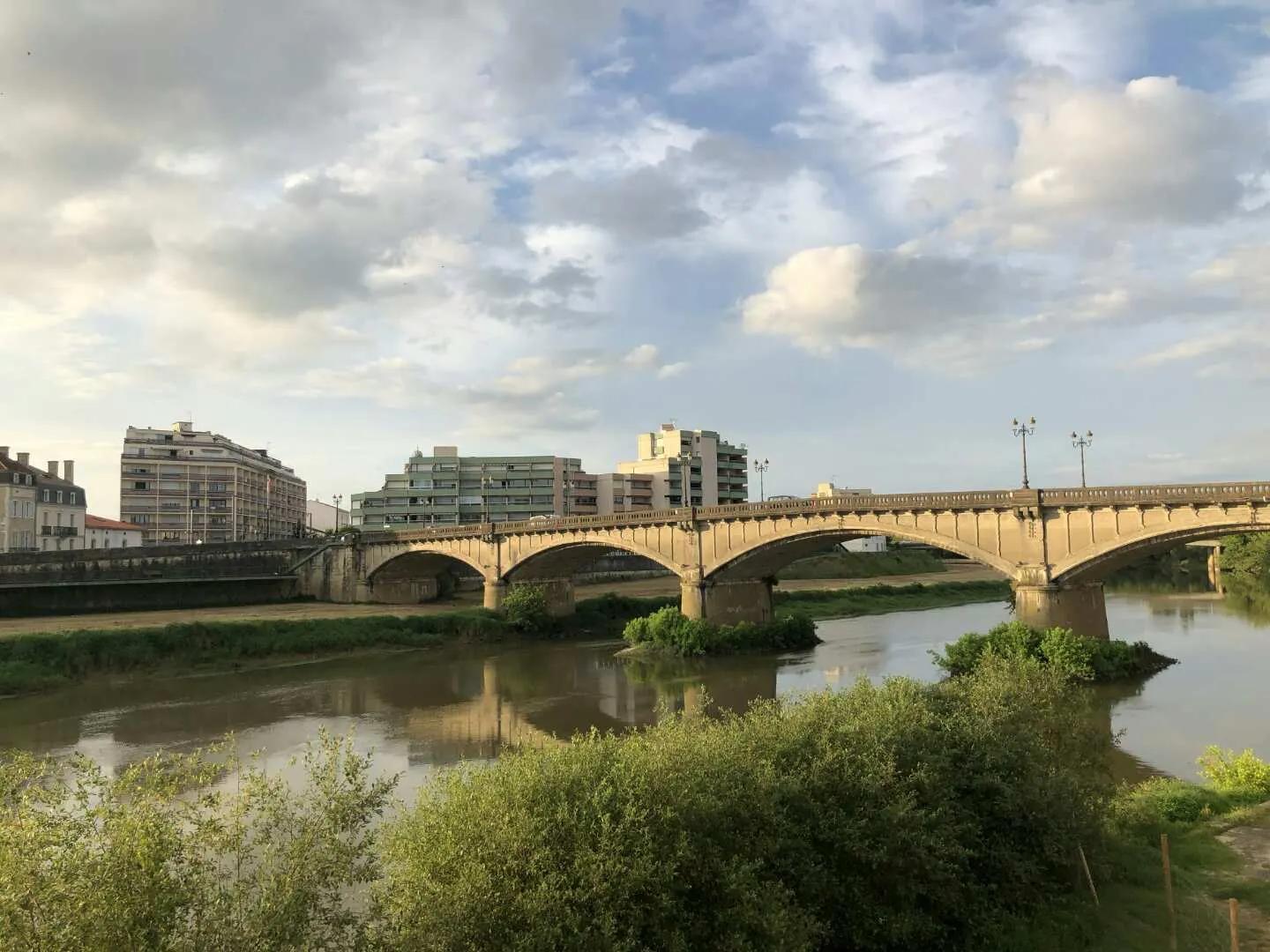 The beauty of the journey: the sunset on the bridge in the small town ...