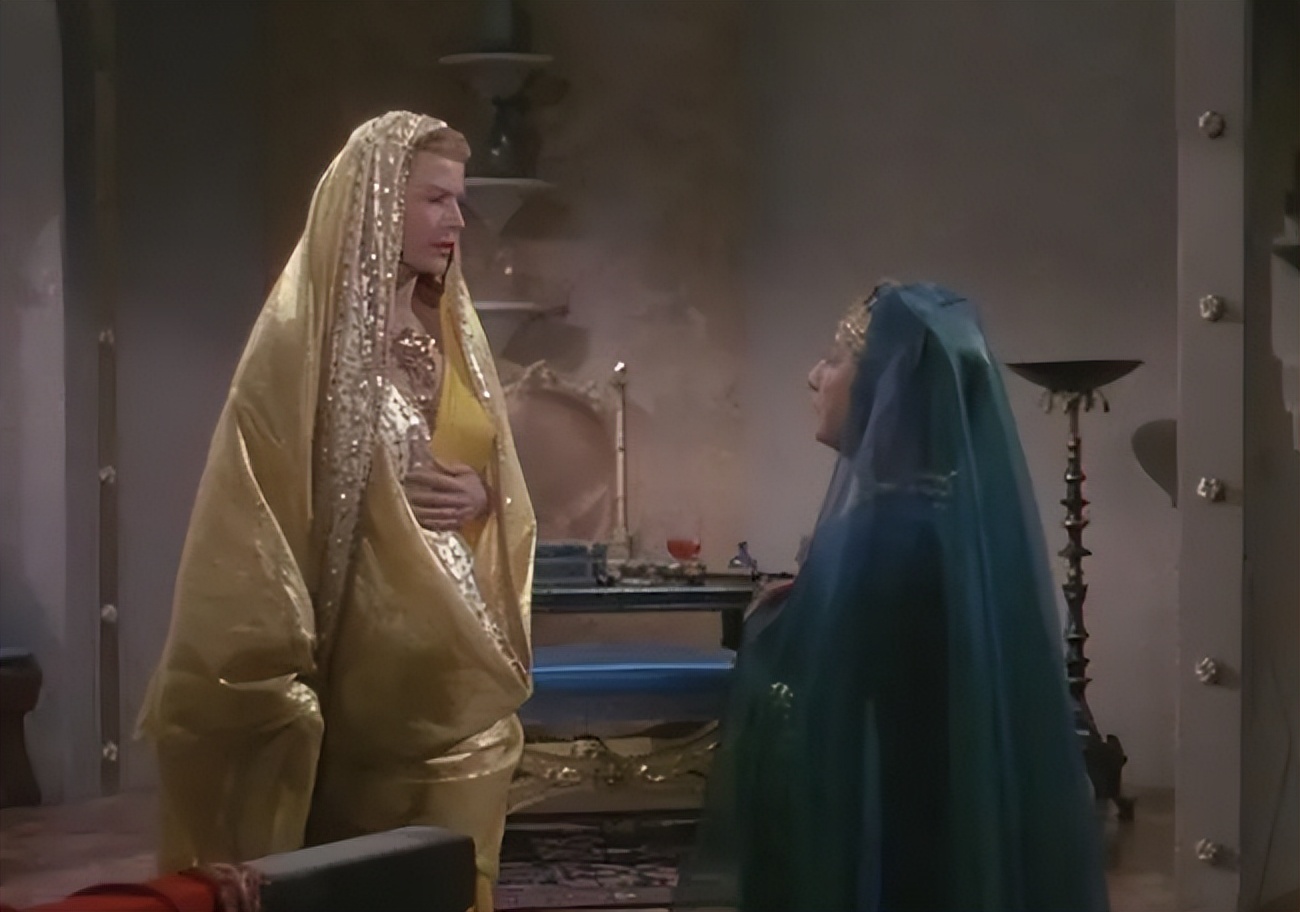 How does Hayworth's performance of "Salome" convey the emotional charm ...