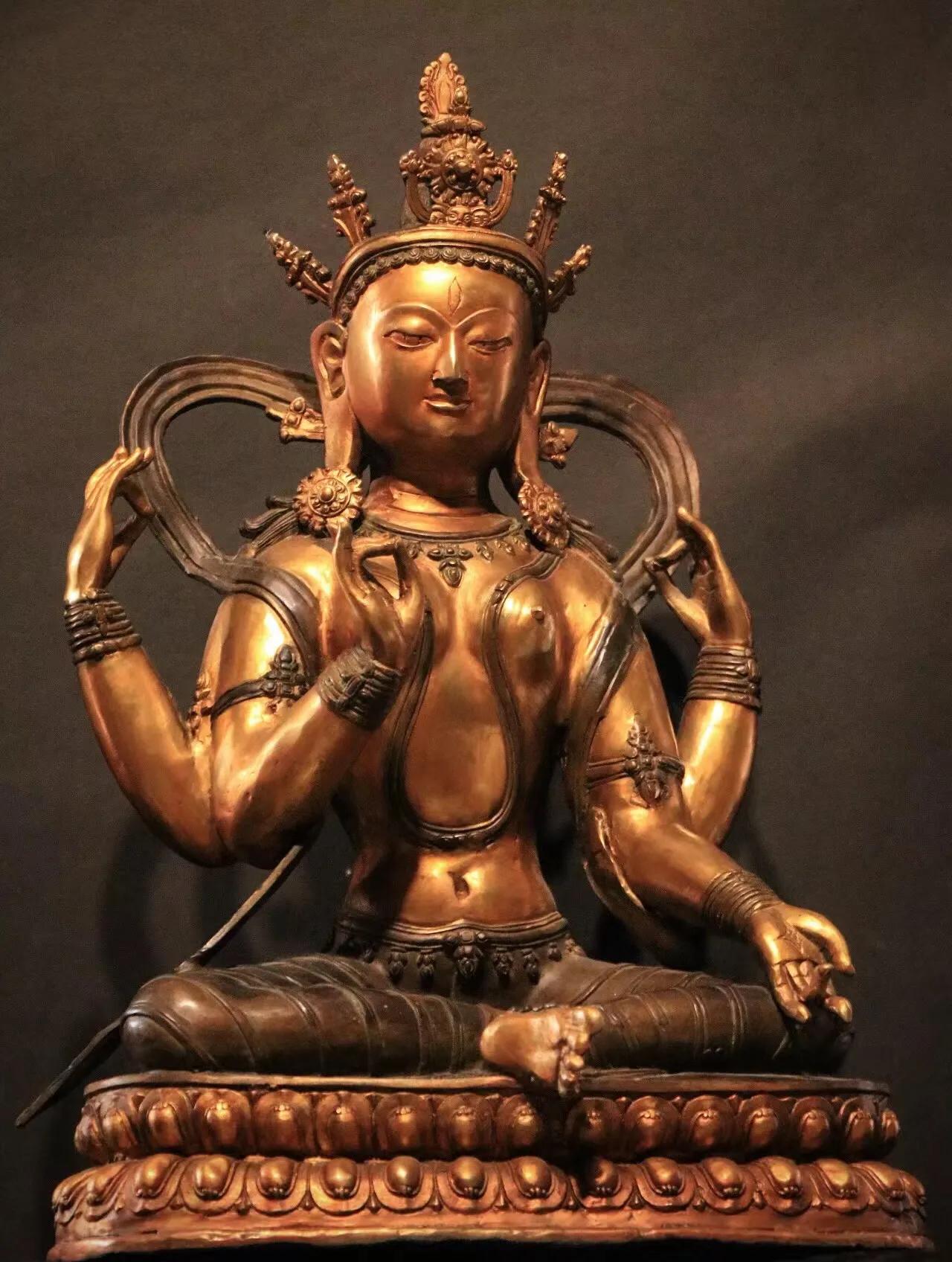 The four-armed gilt bronze statue of Tara is 50 long, 34 wide and 22 cm ...