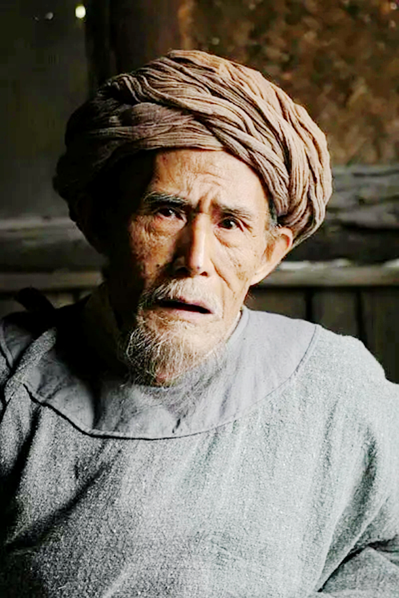 Old movie man: he is the old curator of the library in "Hero" and he is ...
