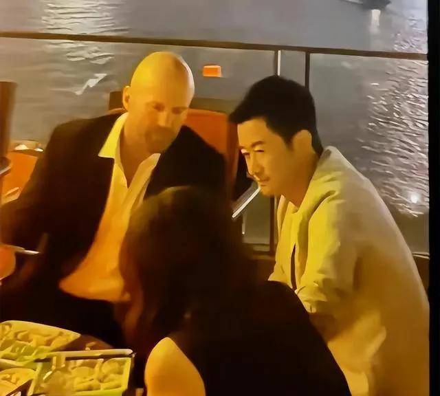 Wu Jing and Jason Statham eat dumplings on the Bund in Shanghai - iNEWS