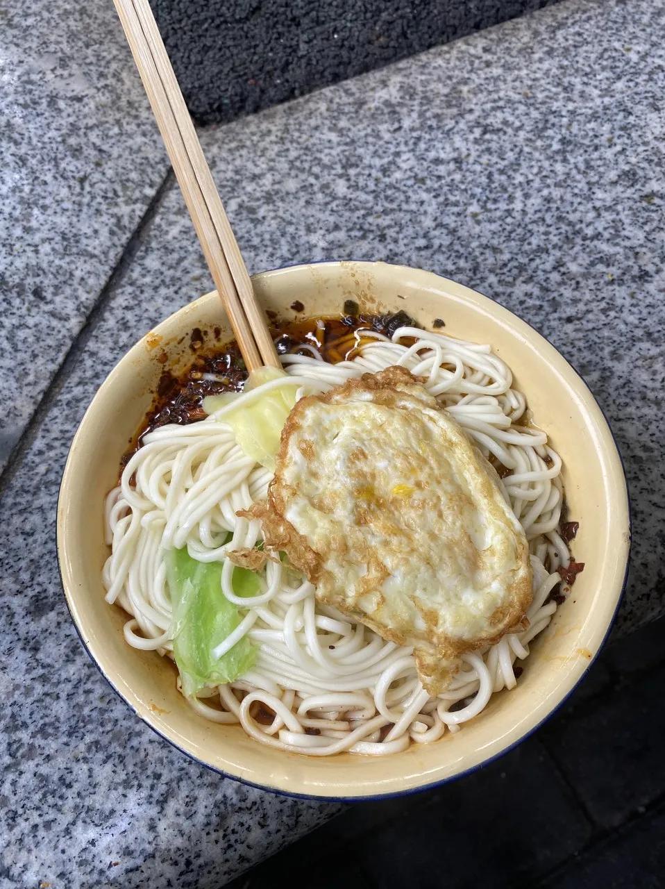 Which authentic Chongqing noodle shop?These "small noodle restaurants ...