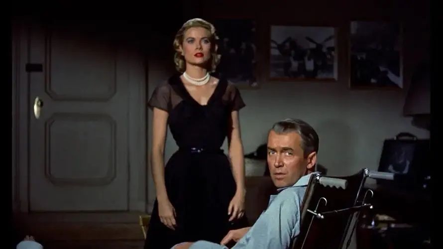 "Rear Window": Jeff uses binoculars to observe the lives of neighbors ...