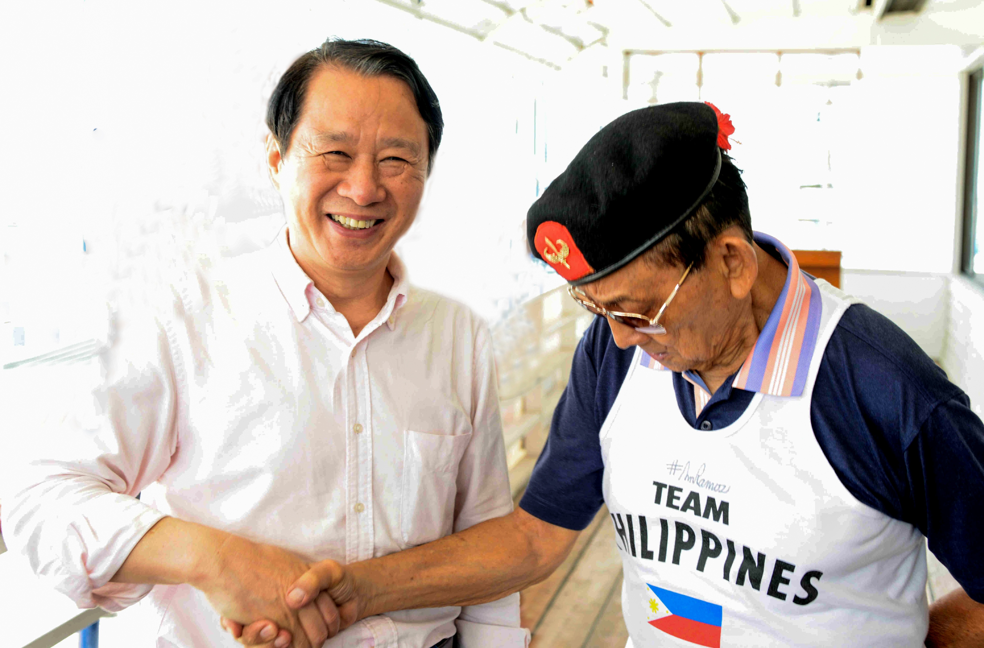 The story behind the photo: Arm wrestling with former Philippine ...