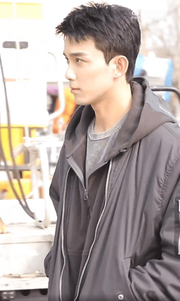 Wu Lei puts his hands in his pockets for the filming of the promotional ...