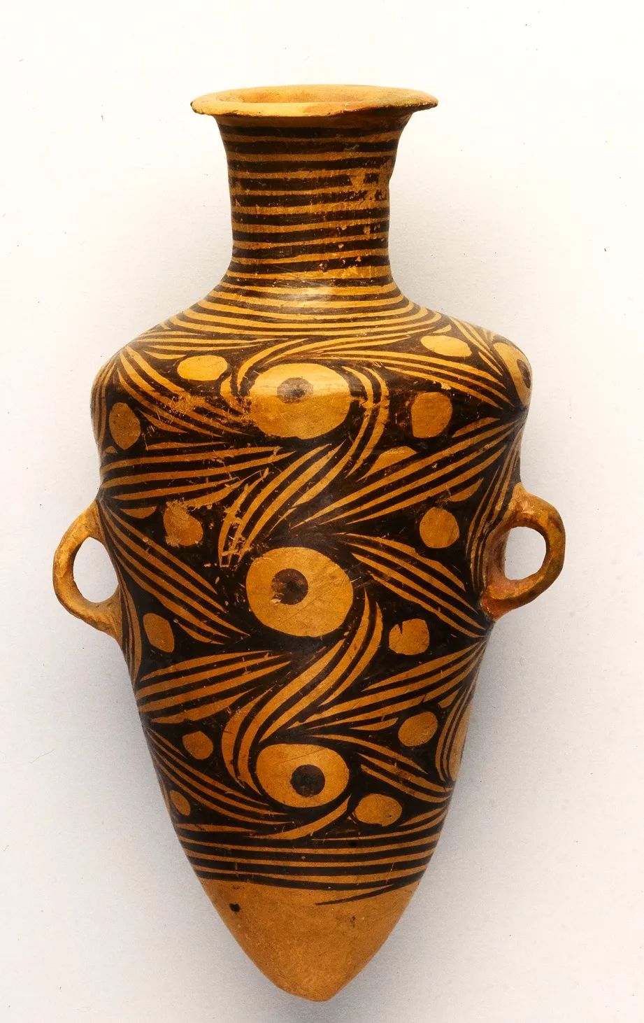 Painted pottery vase with spiral pattern and pointed bottom: the ...