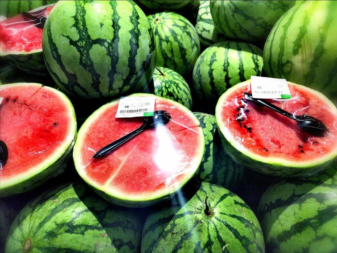 Why do fruit shops like to sell watermelons in half? There are a lot of ...
