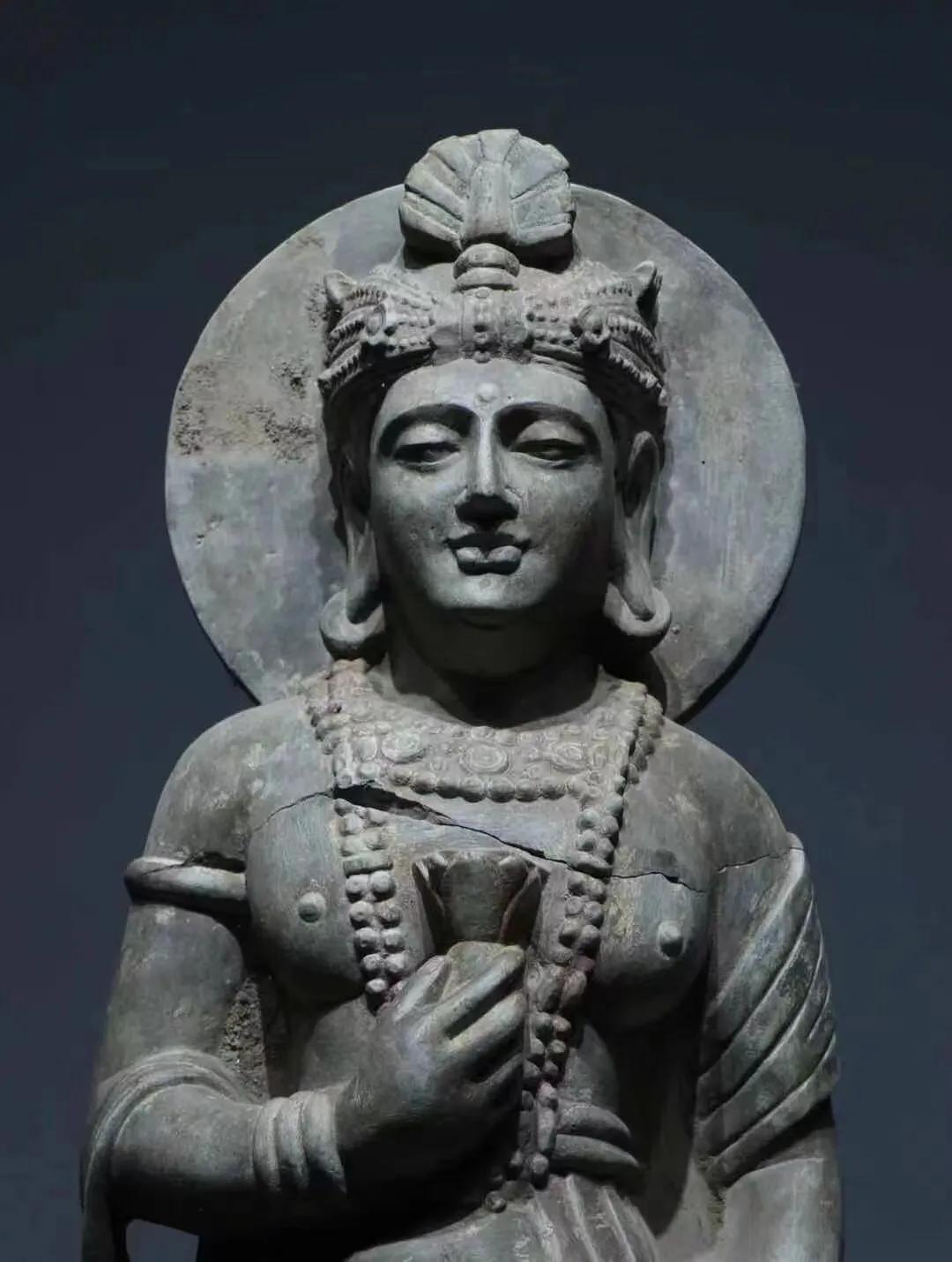 Gandhara Indian Buddha statue, holding a lotus flower, finely carved ...