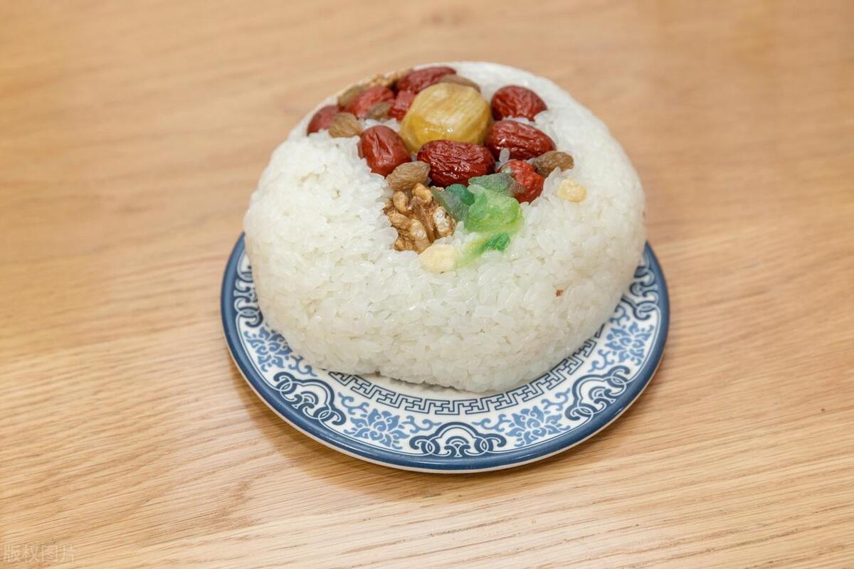 Eight-treasure rice, a delicacy made of glutinous rice and various ...
