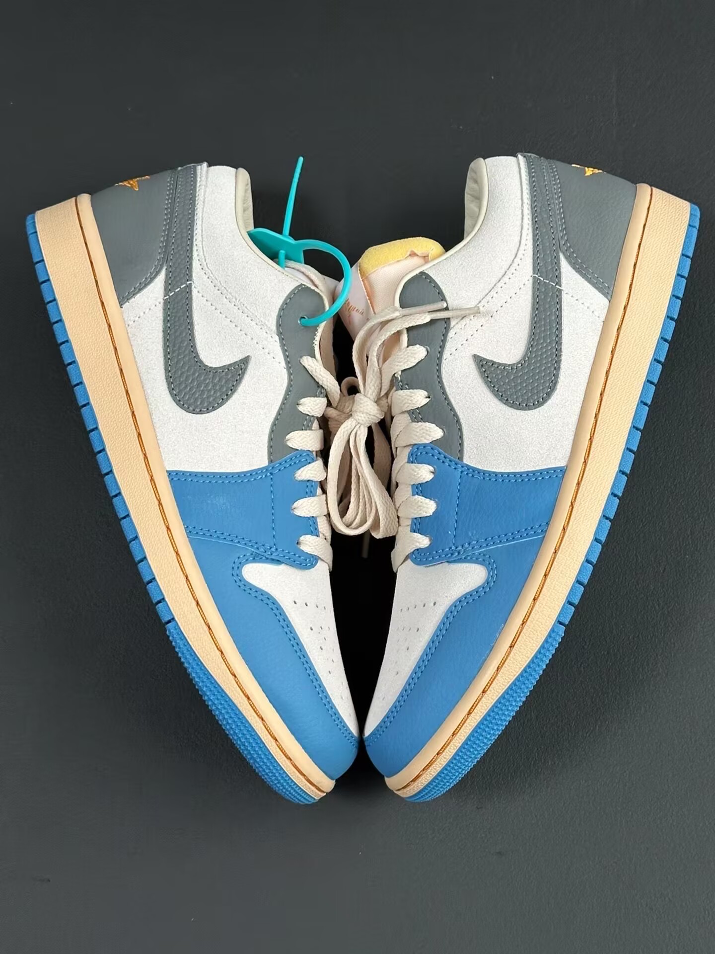 "I really like this pair of blue-gray low-top AJ1s." - iNEWS