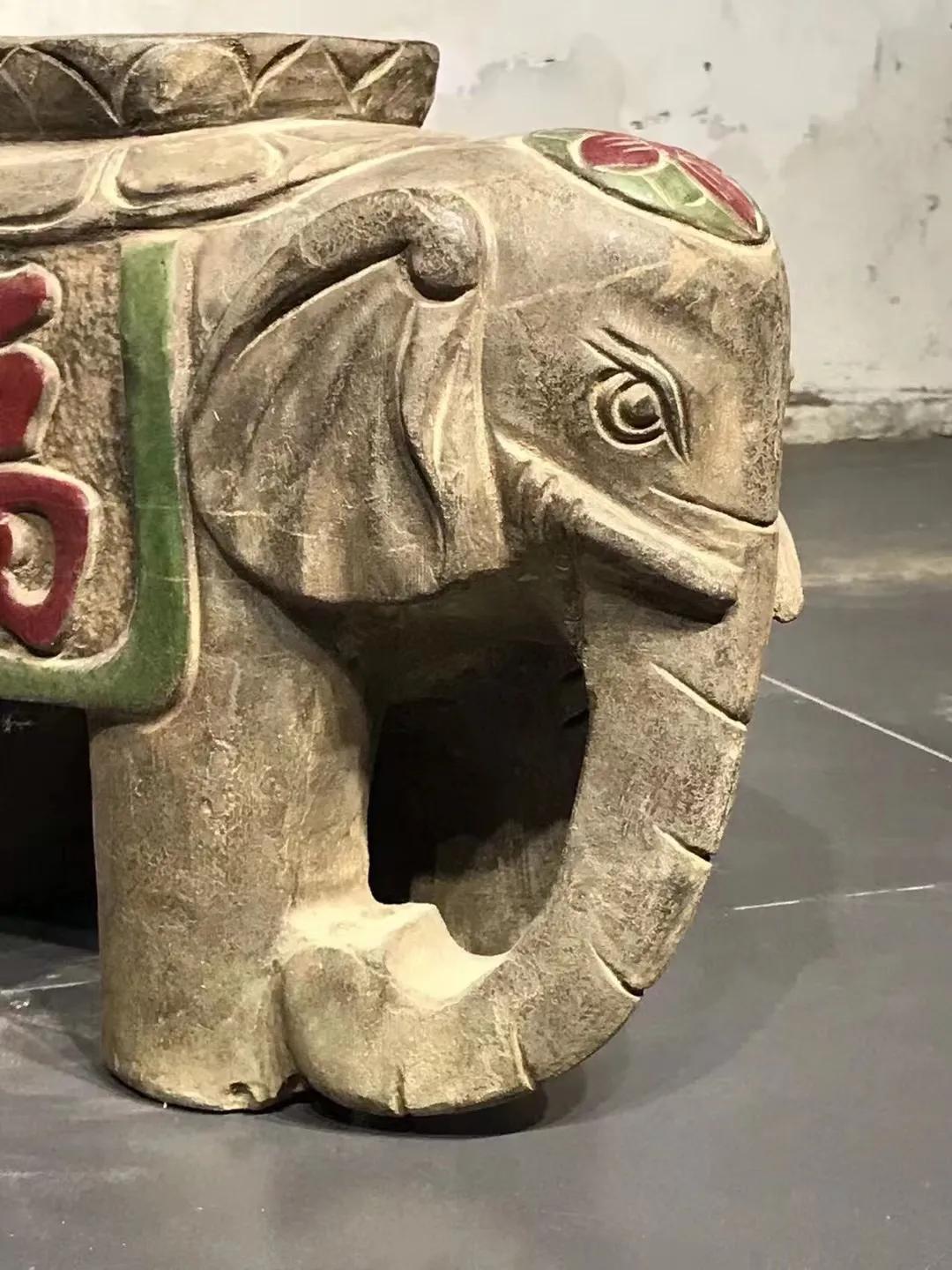 A pair of bluestone painted lucky elephants in size.40 long.The high 30 ...