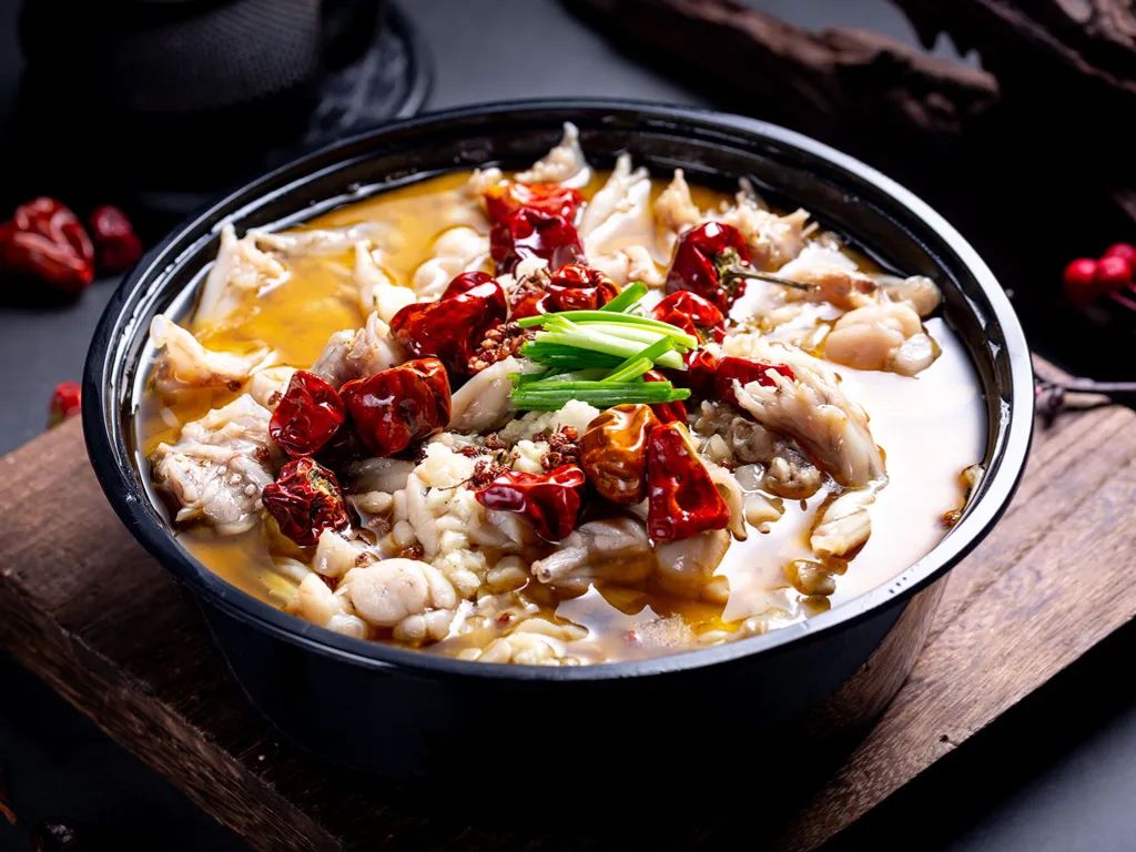 The hotel's signature bullfrog in sour soup, seasoned with Pan's House ...