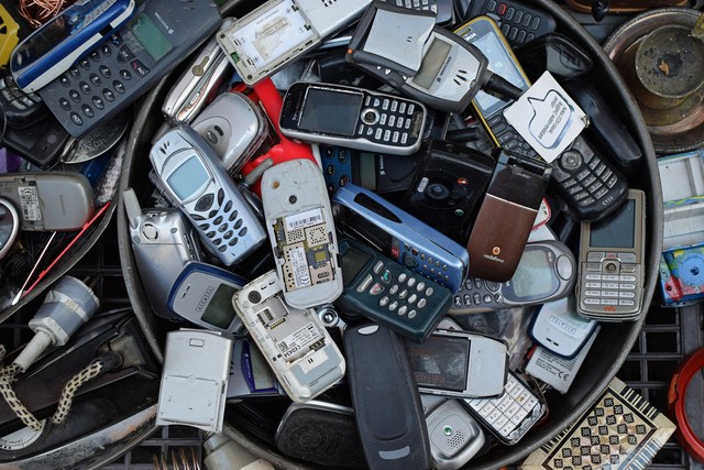 A buddy of a friend, who makes second-hand mobile phones, has an annual ...
